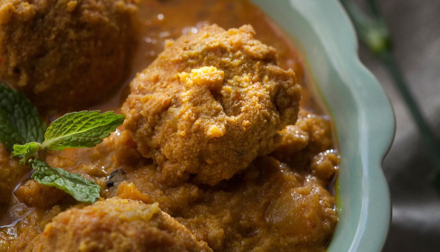 Steamed Lentil Balls In Tamarind Gravy - Pressy Nathan